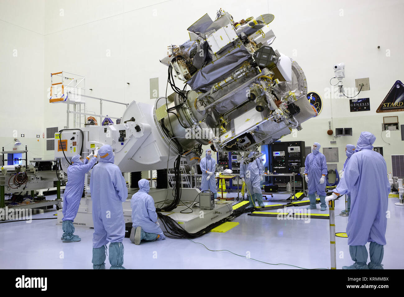 OSIRIS-REx being hoisted on rotation stand and rotated downwards inside ...