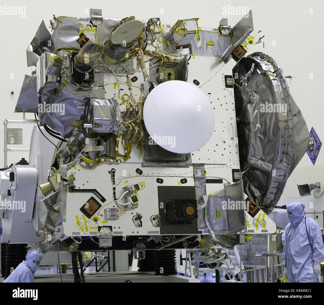 OSIRIS-REx being hoisted on rotation stand and rotated downwards inside ...