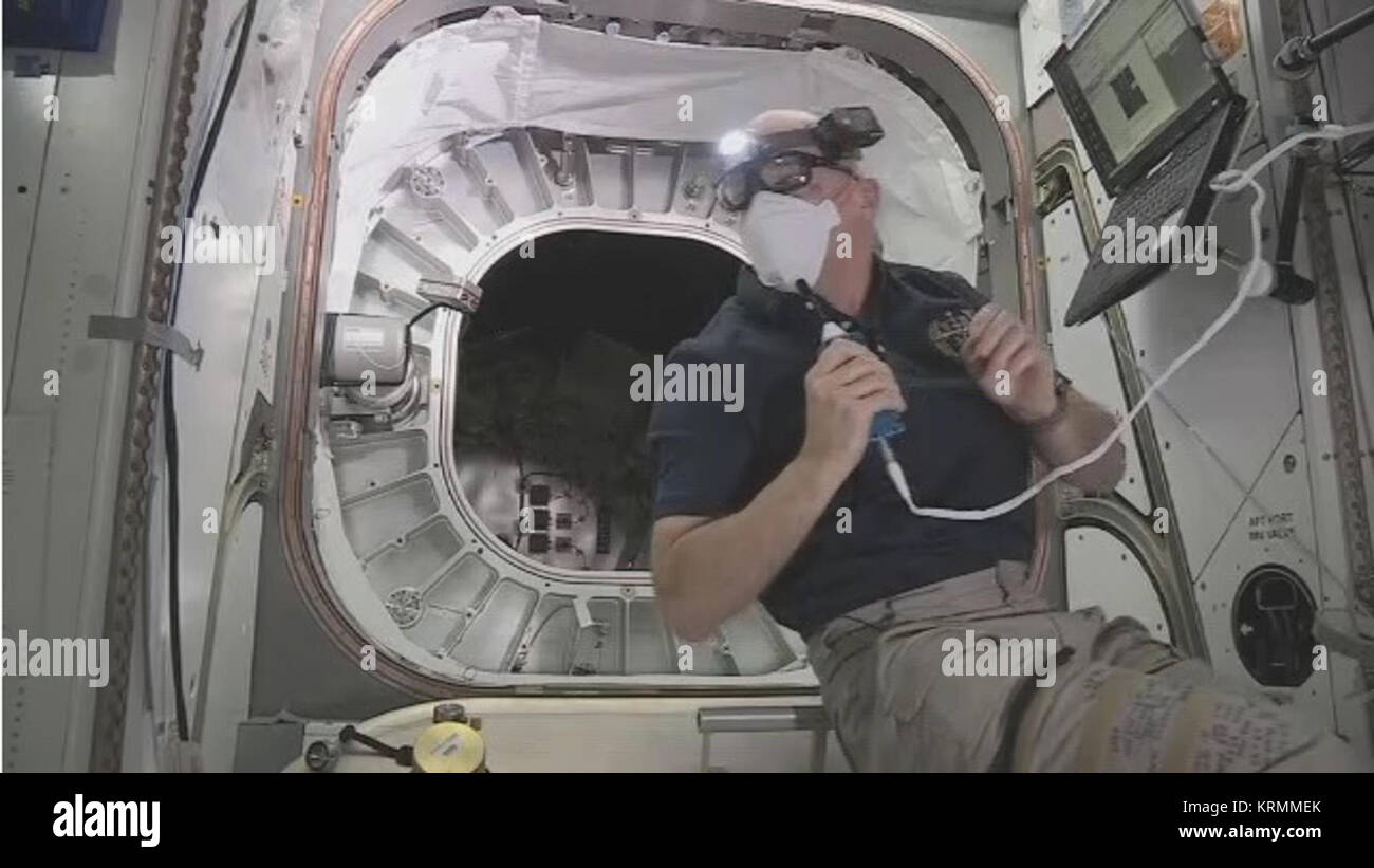 ISS-47 Jeff Williams floats in front of the entrance to BEAM Stock ...
