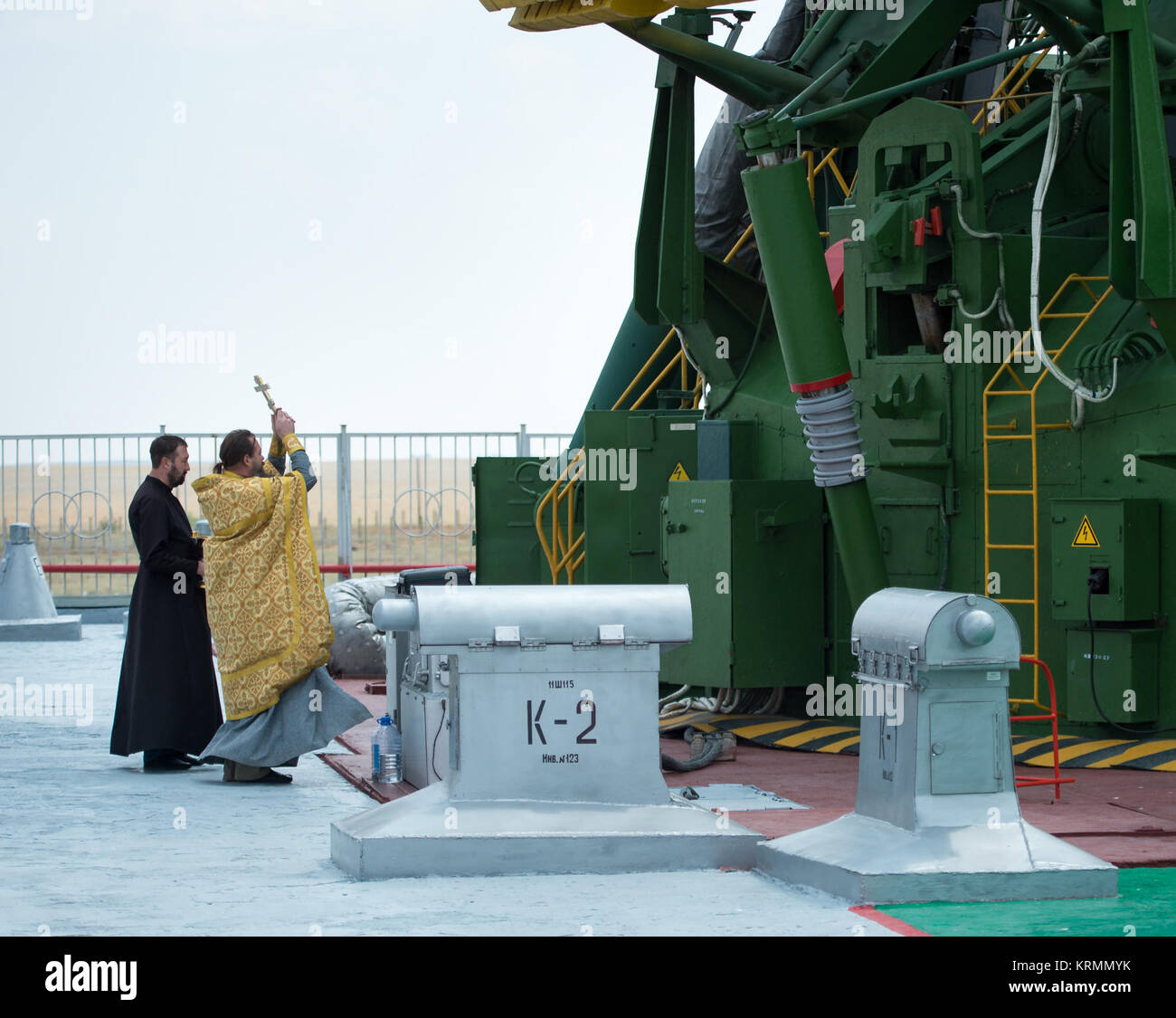 An Orthodox Priest blesses the Soyuz rocket at the Baikonur Cosmodrome ...