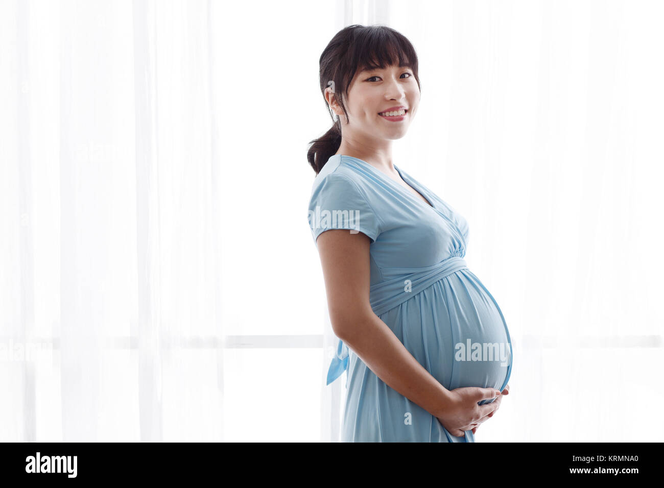 Happy pregnant women Stock Photo - Alamy