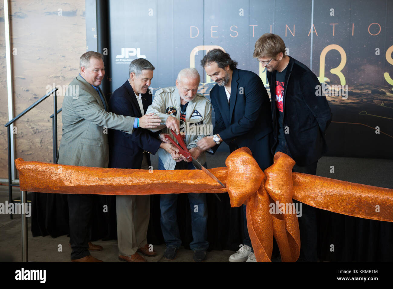 A ceremonial ribbon is cut for the opening of new Destination: Mars ...