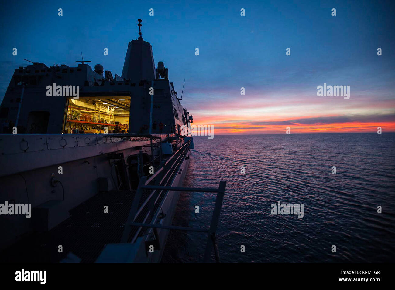 A colorful sunset illuminates the water on the second day of Underway ...