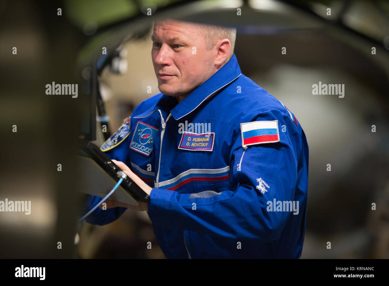 ISS-50 Oleg Novitskiy wearing a flight suit aboard the ISS Stock Photo ...