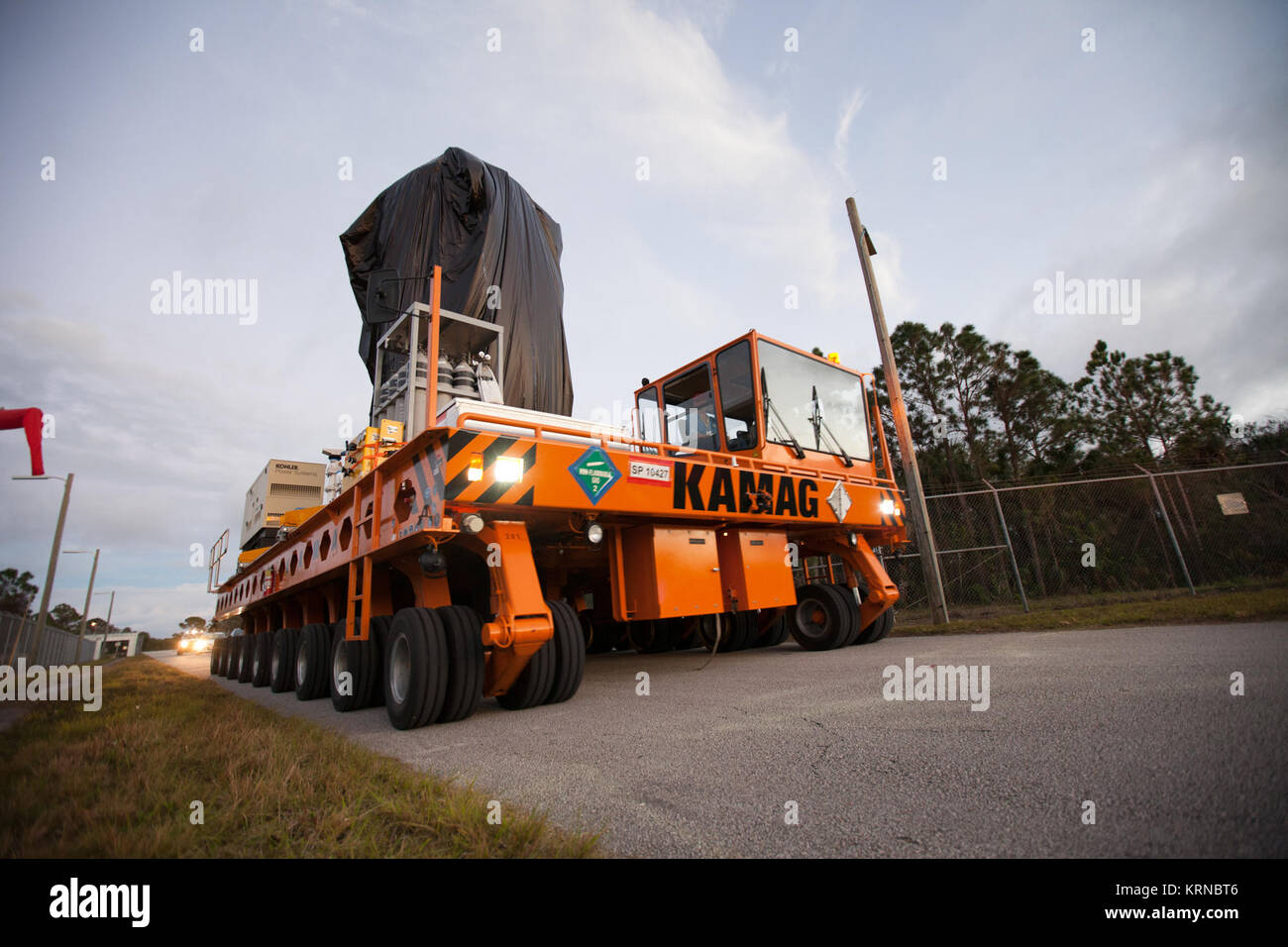 A KAMAG transporter with Orbital ATK's CYGNUS pressurized cargo module ...