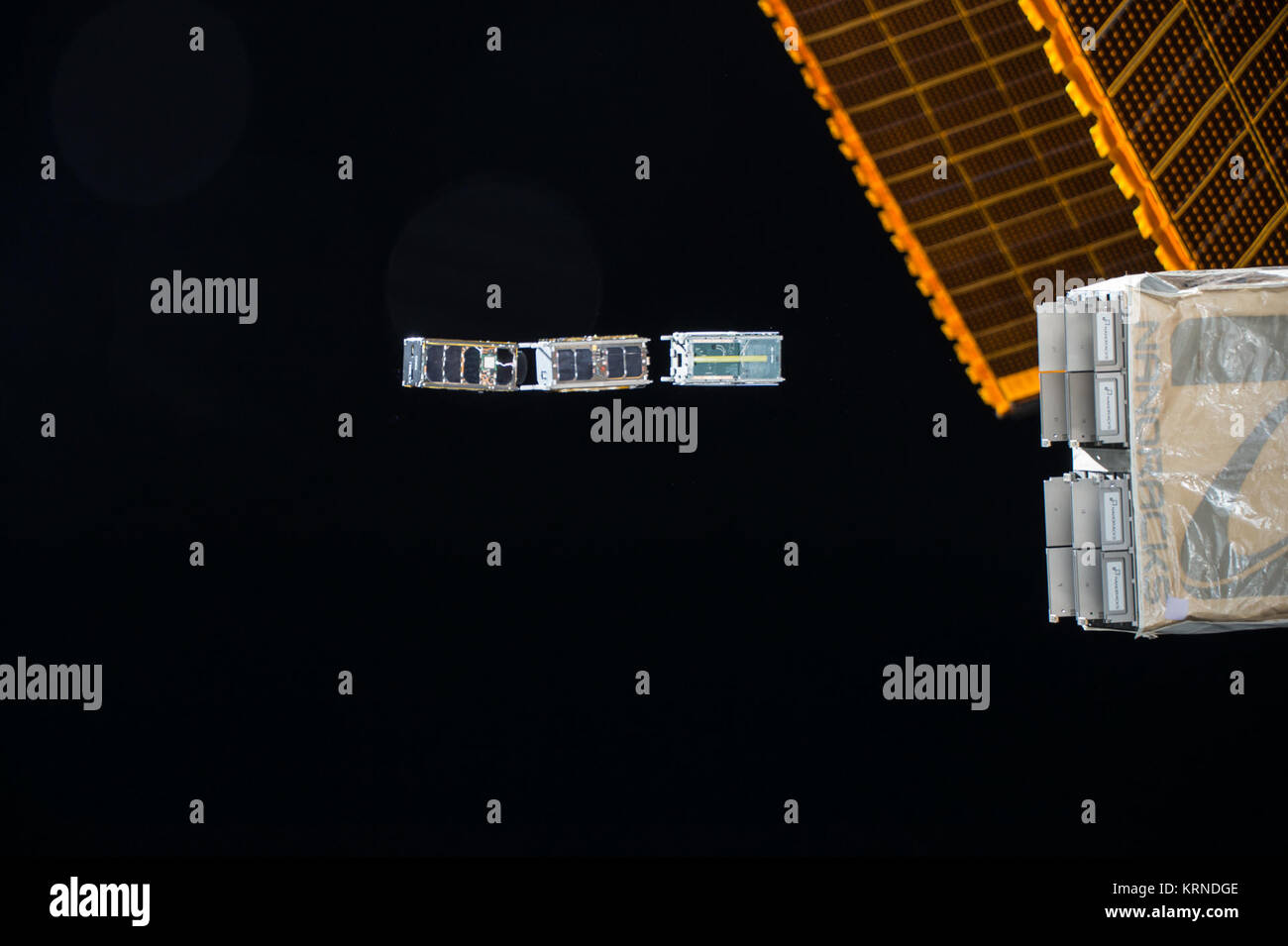 ISS-51 CubeSat deployment - Three space weather CubeSats (1 Stock Photo ...