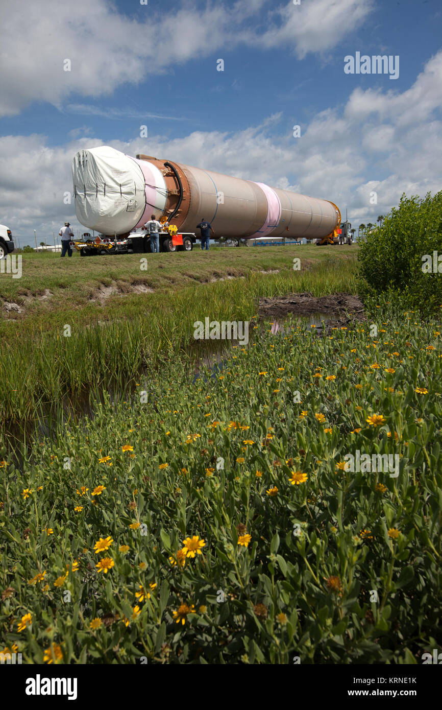 A United Launch Alliance Atlas V rocket booster is transported to the ...