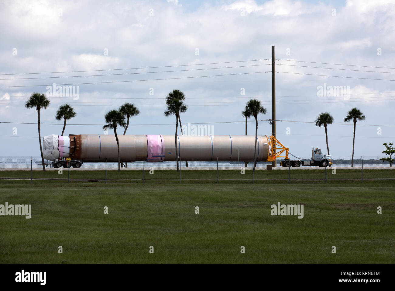 A United Launch Alliance Atlas V rocket booster is transported to the ...
