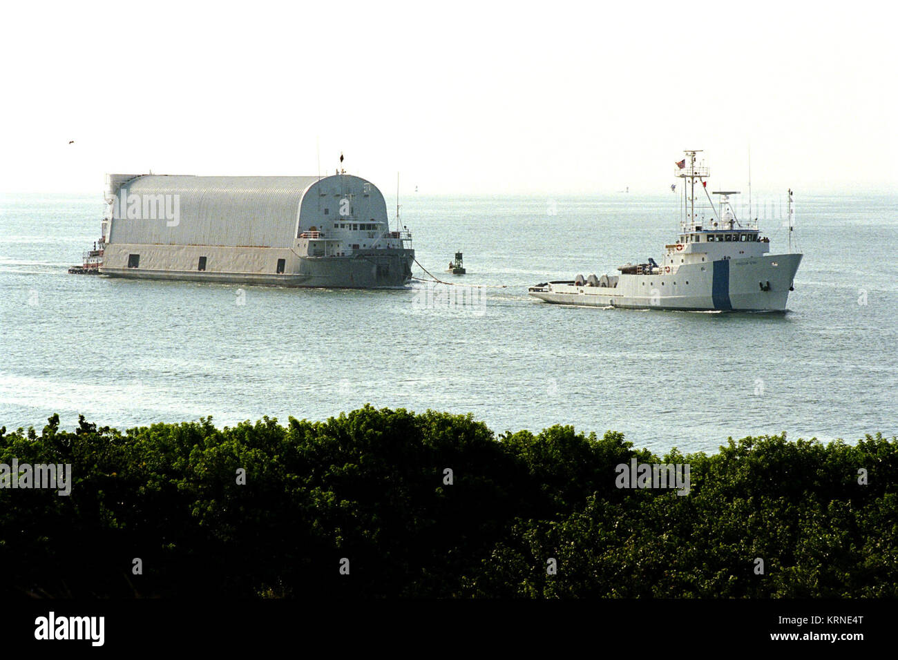Freedom Star towing Poseidon barge with STS-95 ET (KSC-98PC-0754 Stock ...