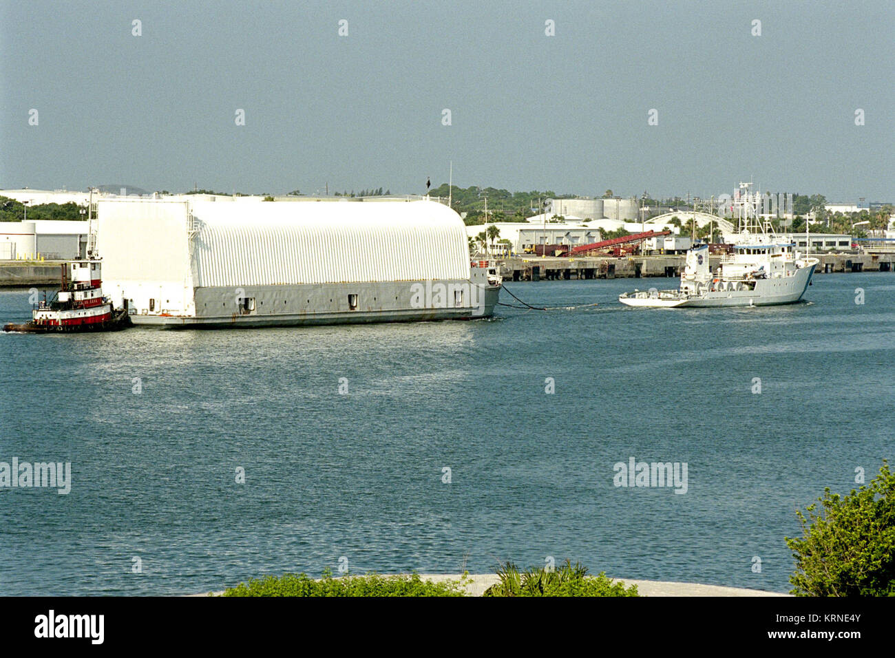 Freedom Star towing Poseidon barge with STS-95 ET (KSC-98PC-0756 Stock ...