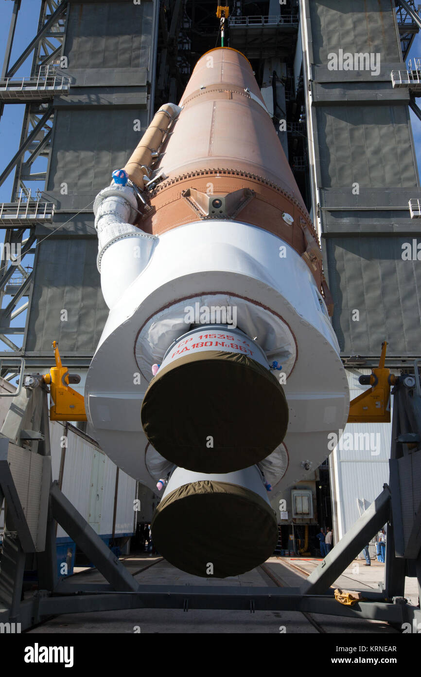 A United Launch Alliance Atlas V first stage is lifted at the Vertical ...