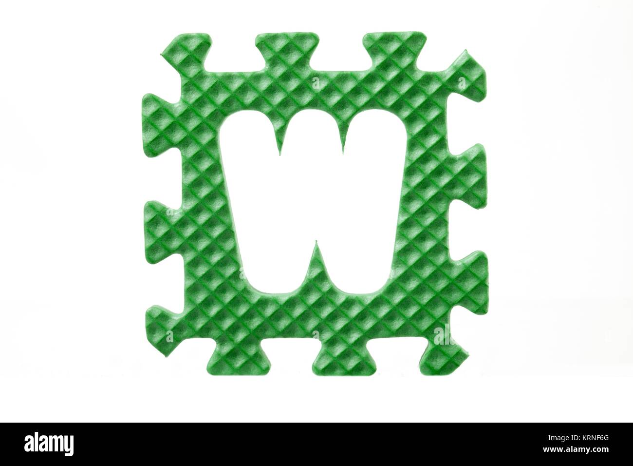 green letter w puzzle piece Stock Photo - Alamy