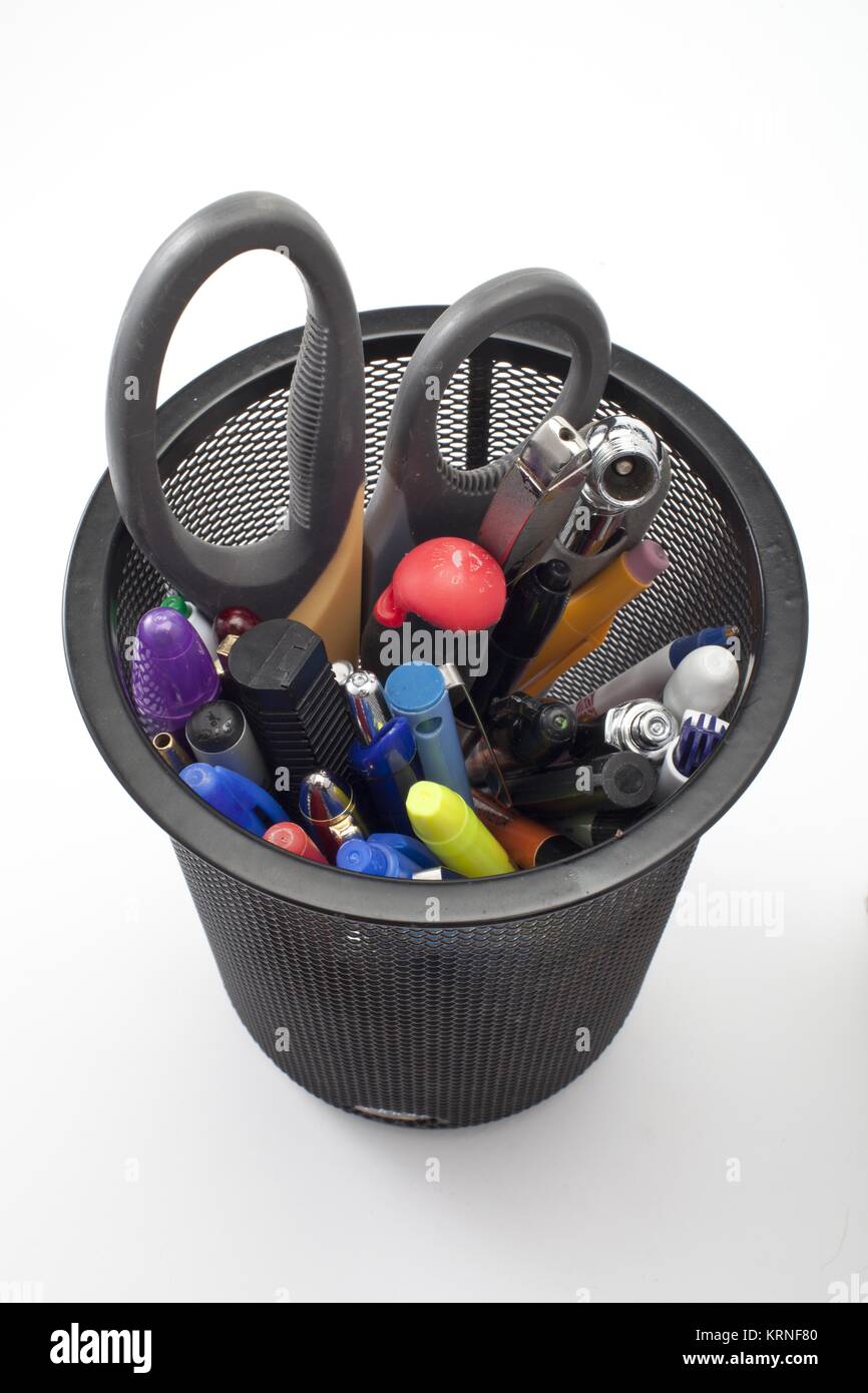 high angle shot of pen holder with pens and scissors Stock Photo - Alamy