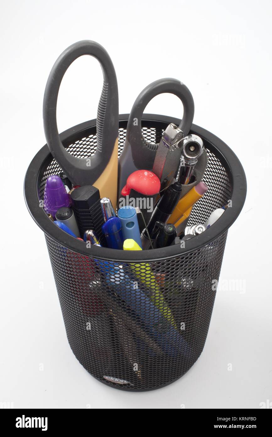image of pen holder with scissors and pens over white background Stock ...
