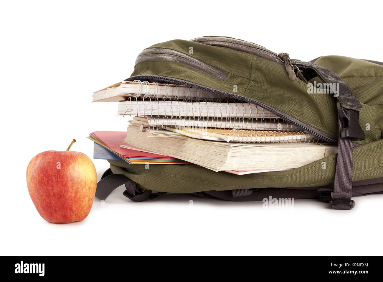 loaded backpack and apple Stock Photo - Alamy