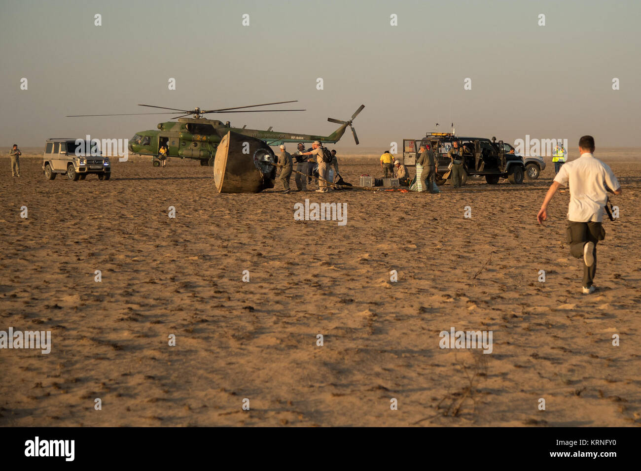 Russian Search and Rescue teams arrive at the Soyuz MS-04 spacecraft ...