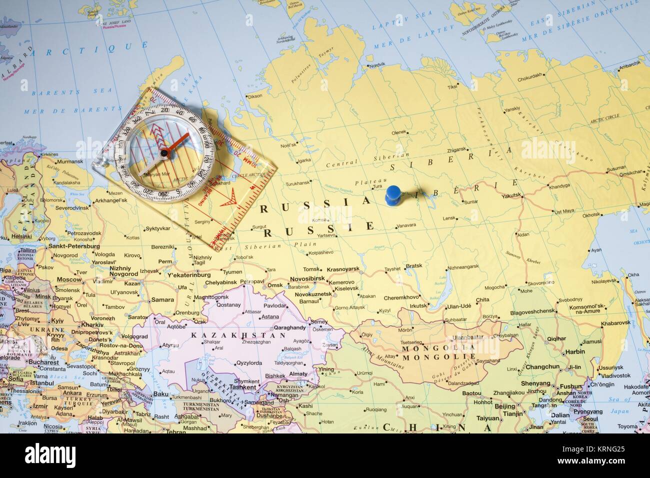 map with compass focusing russia Stock Photo - Alamy