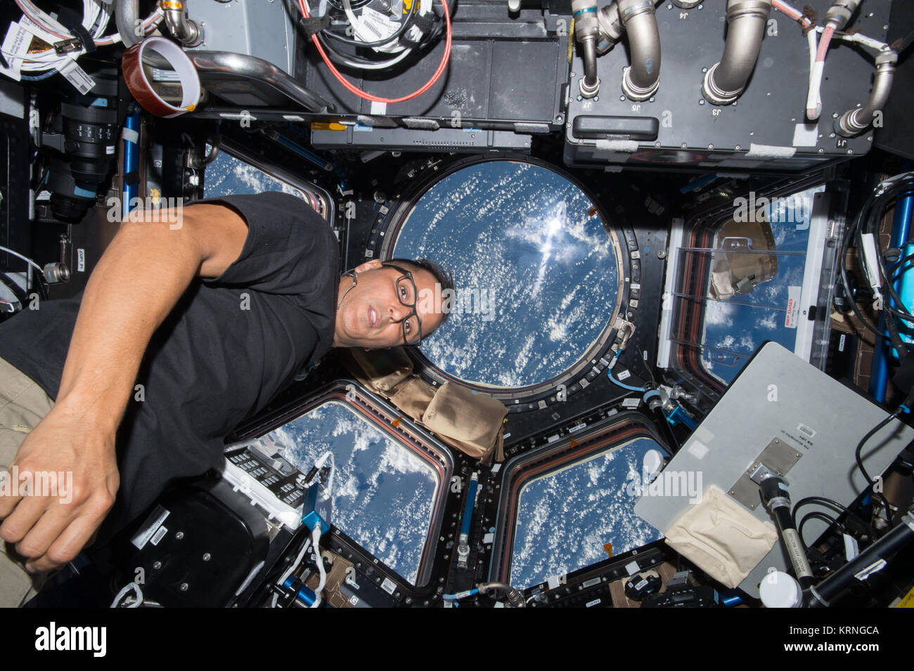 ISS-53 Joseph Acaba works inside the cupola Stock Photo - Alamy