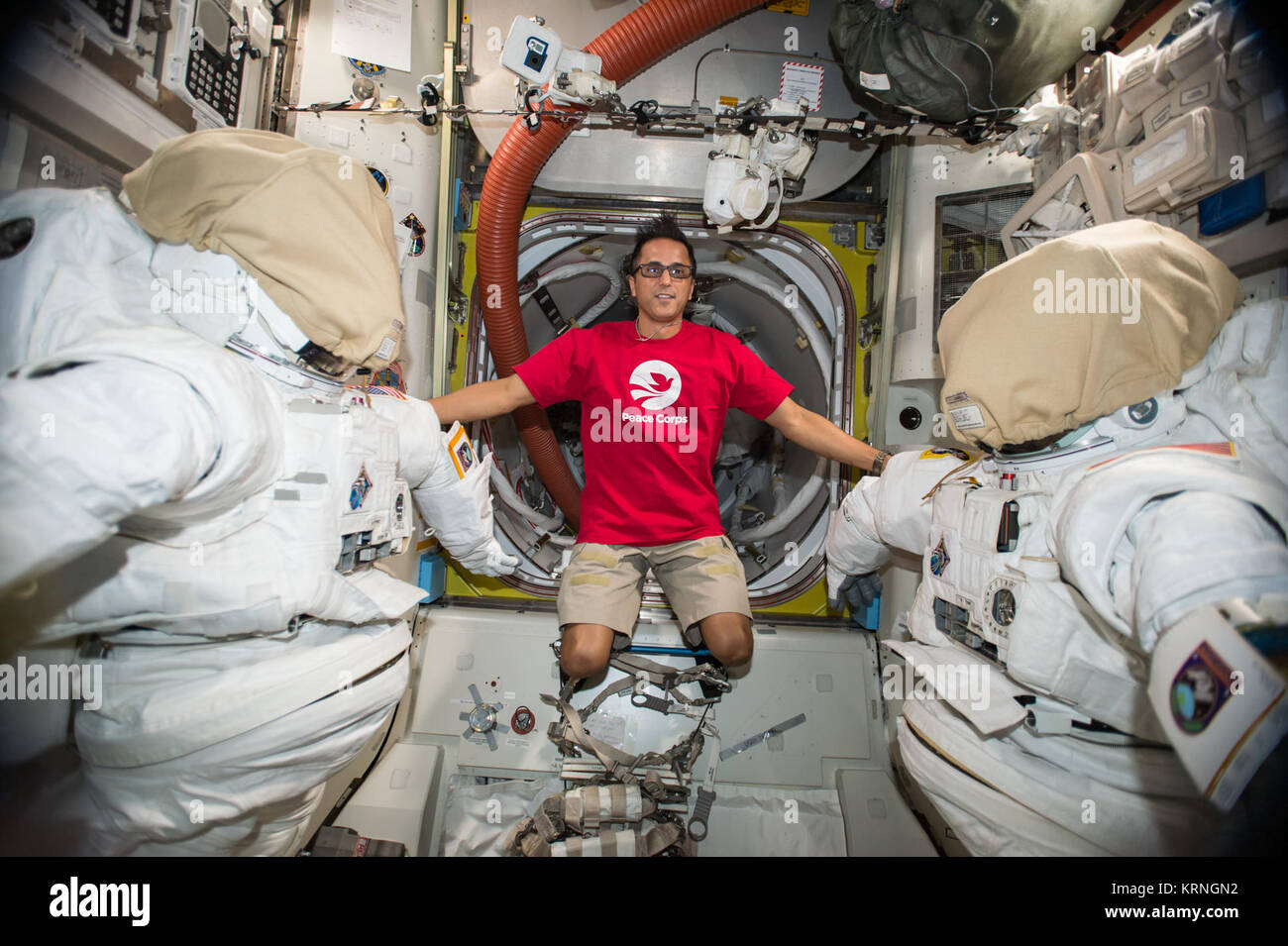ISS-53 Joseph Acaba poses inside the Quest airlock Stock Photo - Alamy