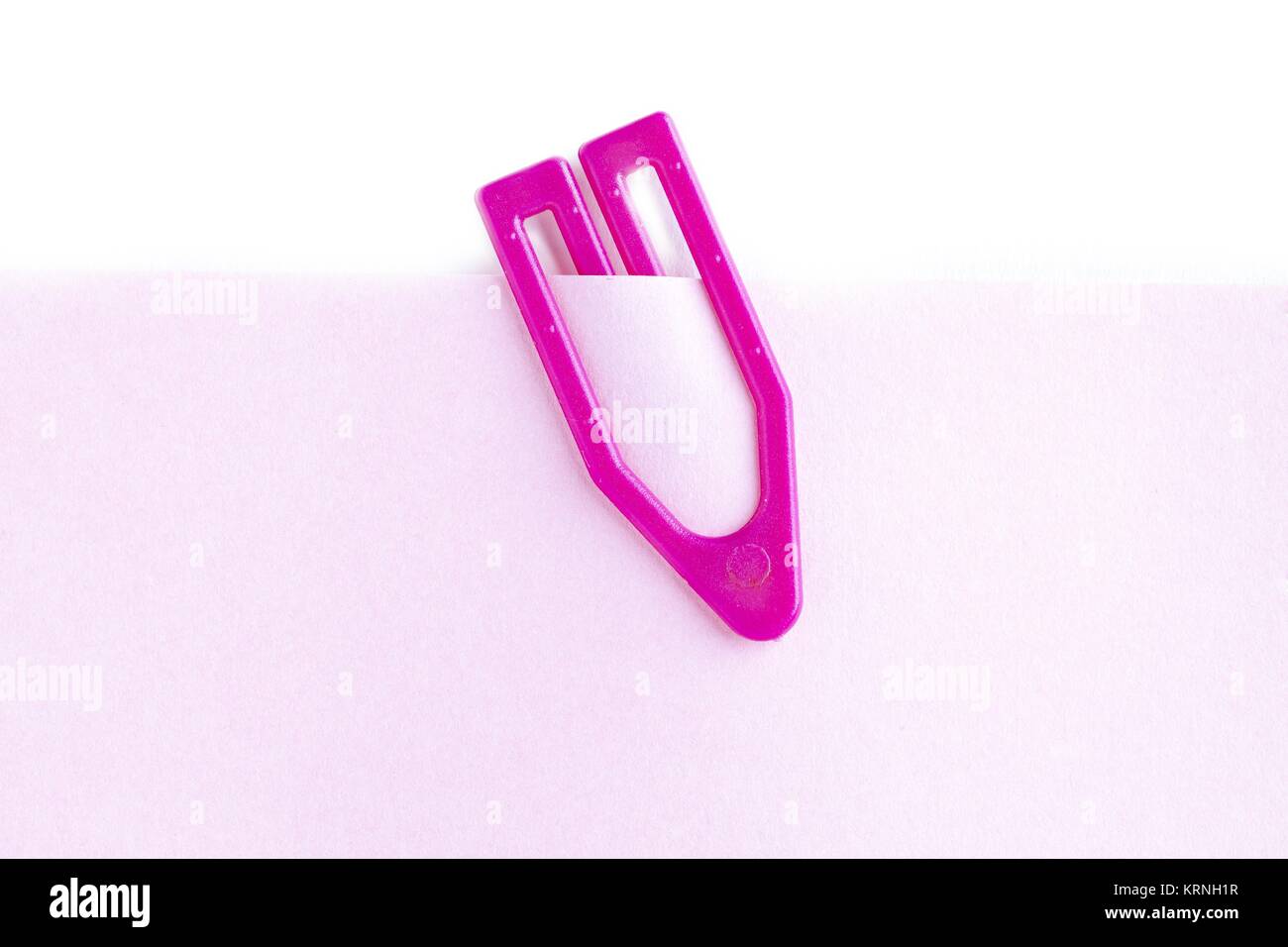 pink plastic paperclip Stock Photo - Alamy