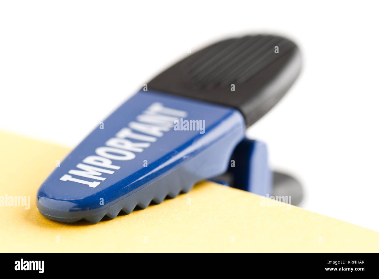 plastic paper clip with important written on it Stock Photo - Alamy