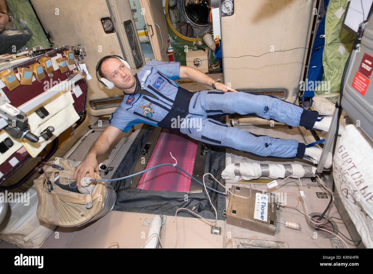 ISS-53 Aleksandr Misurkin with ENose inside the Zvezda service module ...