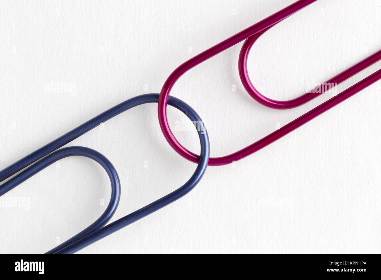 red and blue paper clips Stock Photo - Alamy