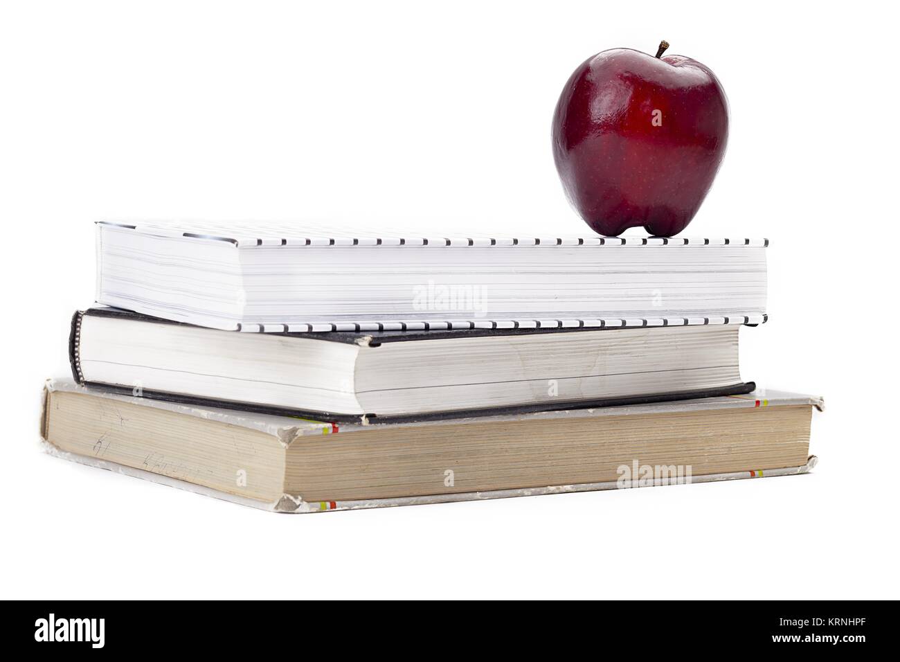 red apple on stack of books Stock Photo - Alamy