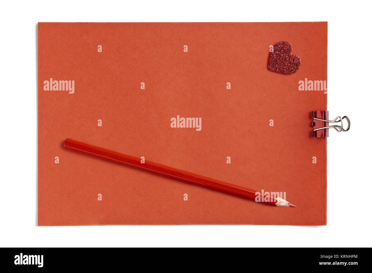 red clipboard and with heart shape and pencil Stock Photo - Alamy