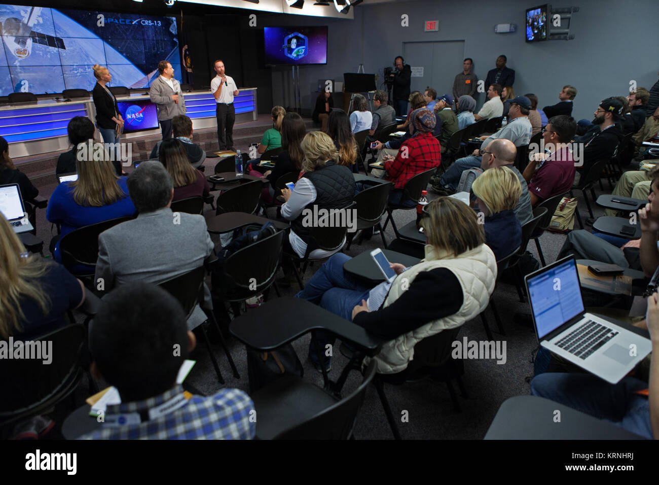 Cheryl Warner of NASA Communications, left, Kirt Costello, deputy chief ...
