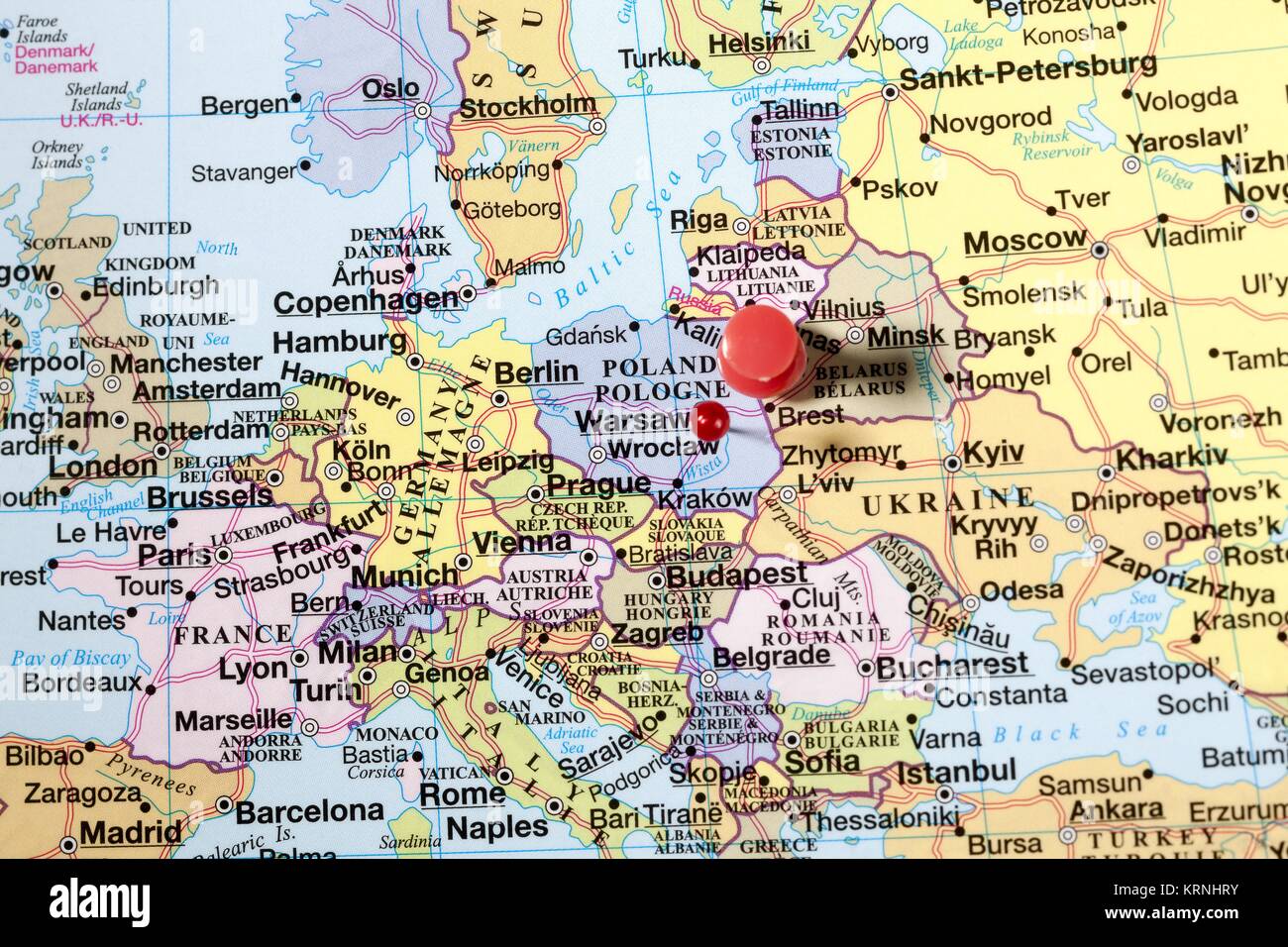 red push pins on map Stock Photo - Alamy