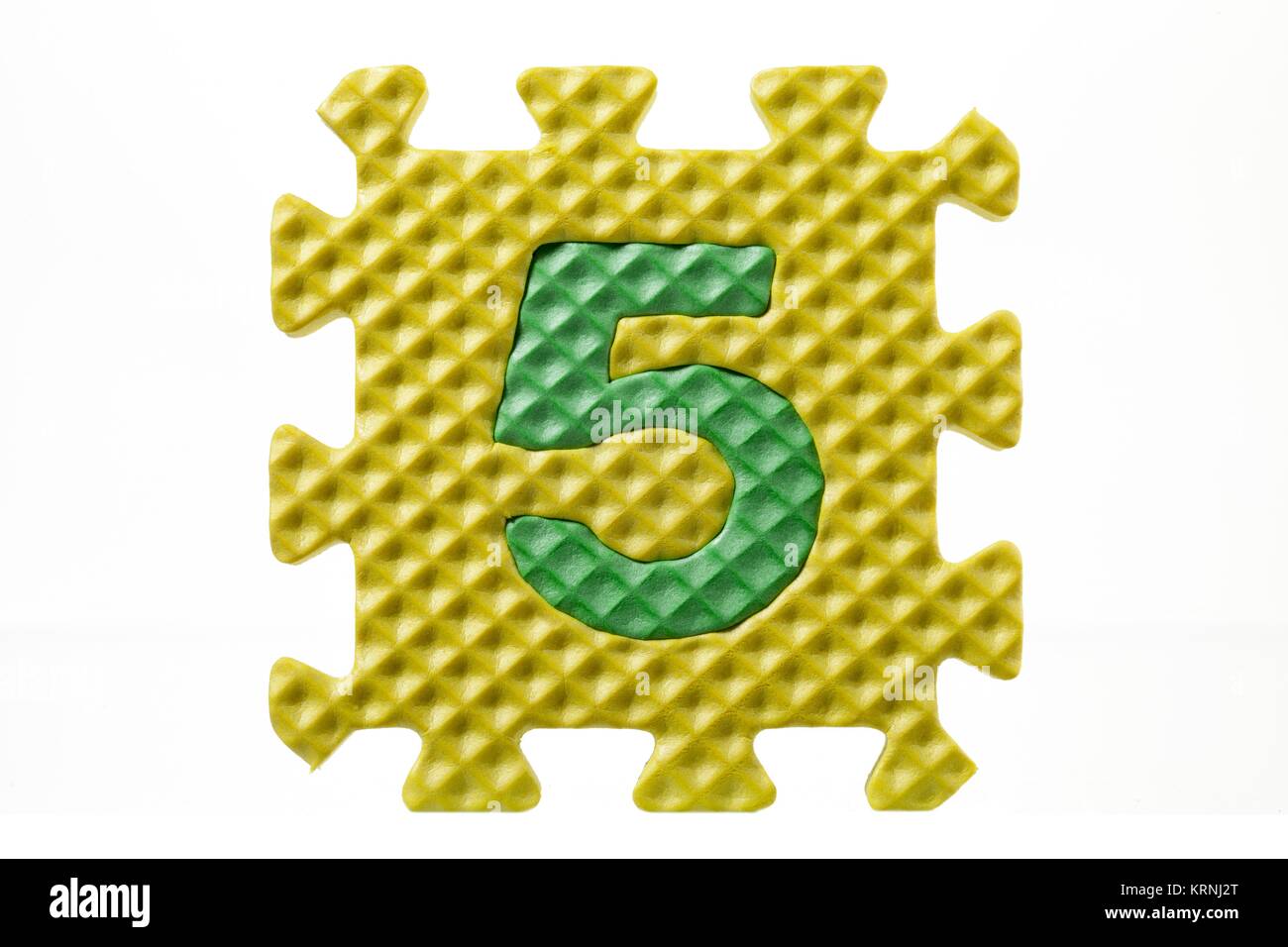 rubber puzzle with number five Stock Photo - Alamy