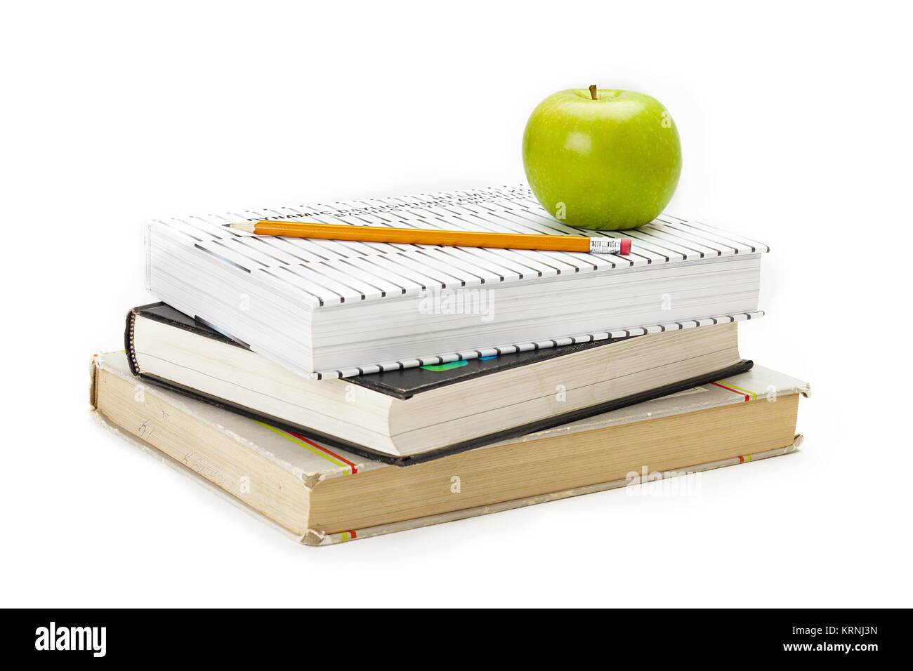 school books with green apple Stock Photo - Alamy