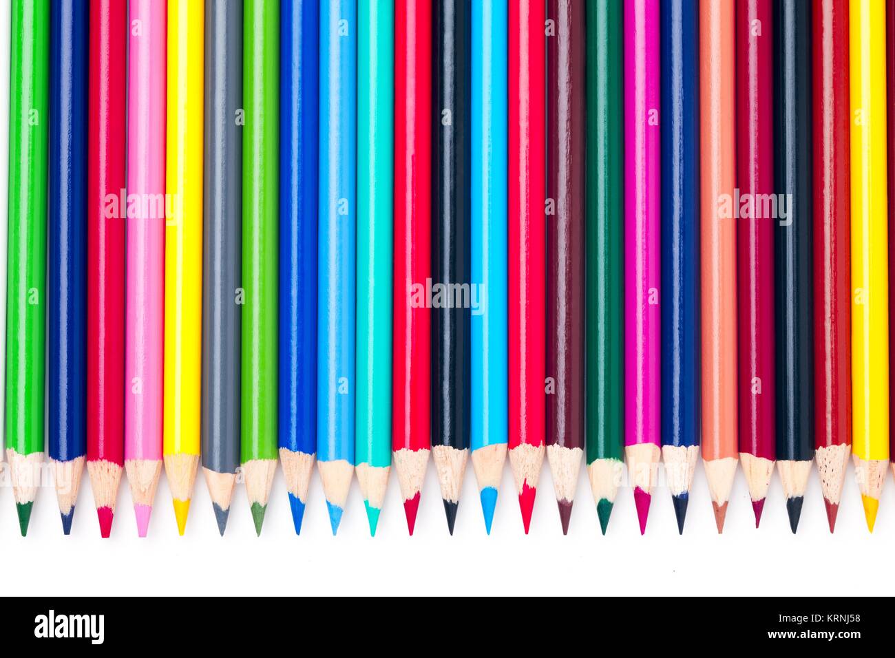 side by side multicolored pencil crayons Stock Photo - Alamy