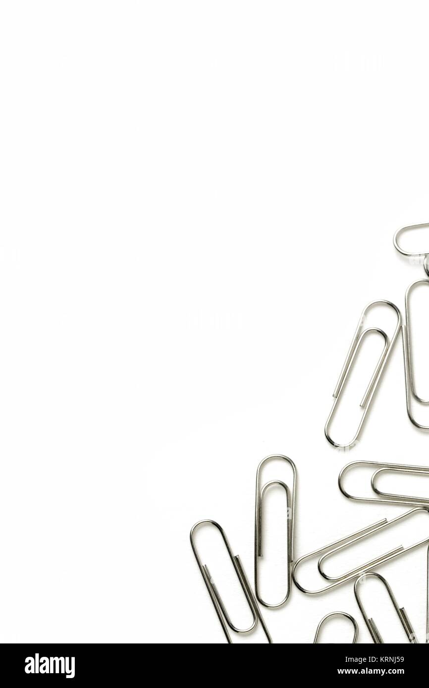 silver paper clips Stock Photo - Alamy