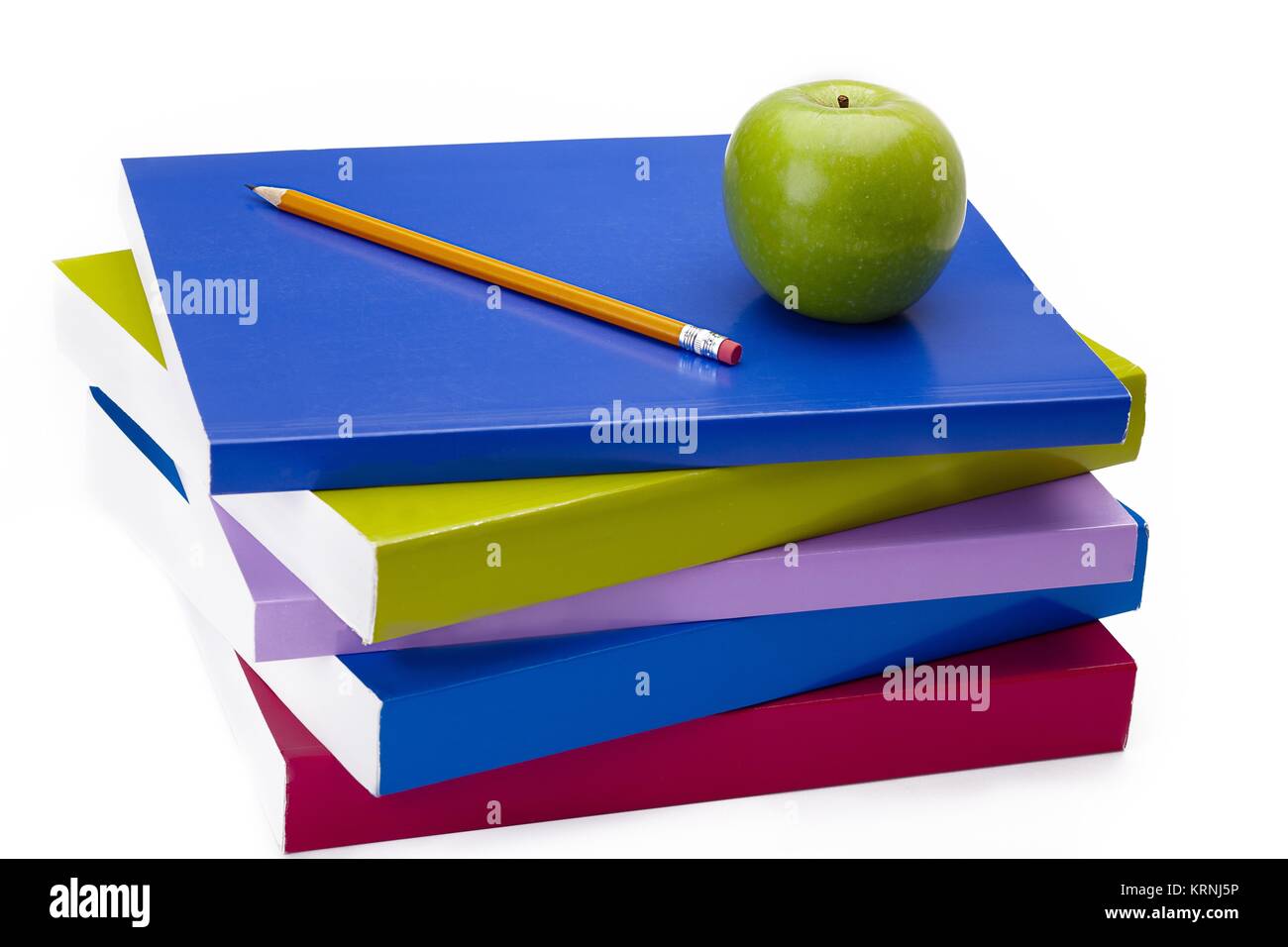 stack of books with apple and pencil on top Stock Photo - Alamy