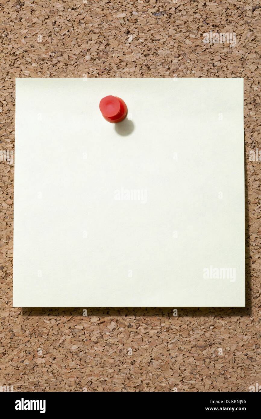 white paper pinned on a wooden background Stock Photo - Alamy