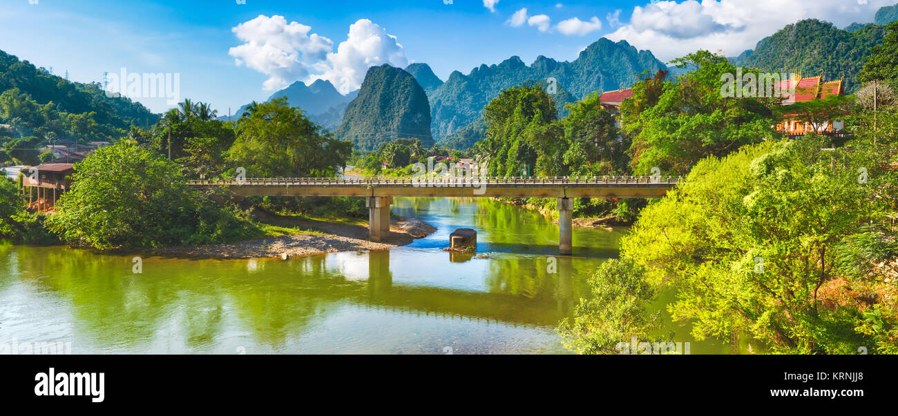 Amazing landscape of Nam Song river among mountains. Bridge on the ...