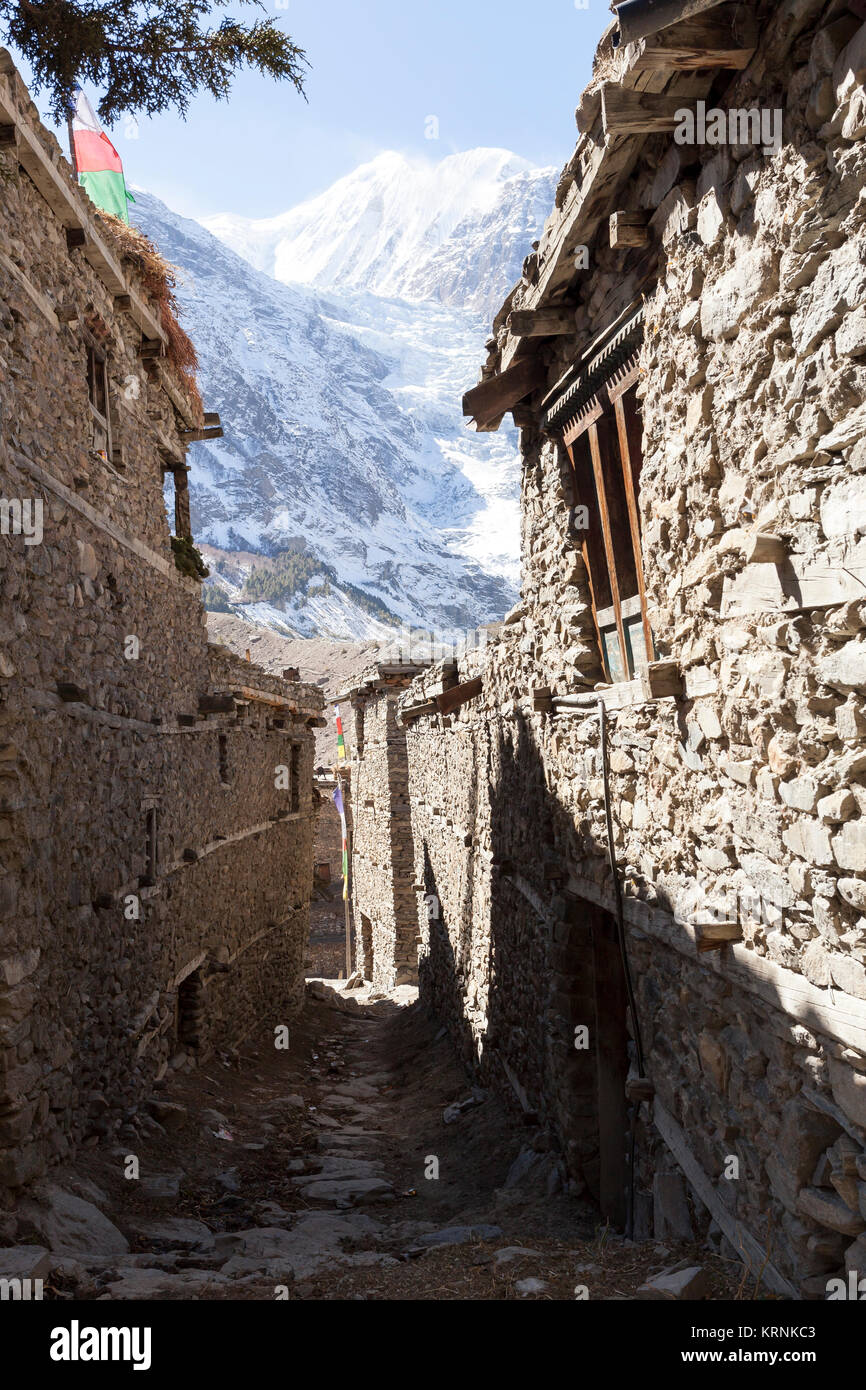Narrow street in Manang - mountain village in Nepal. Himalayas ...