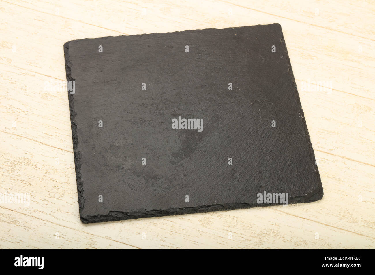 Black stone plate for home and restorant use Stock Photo - Alamy