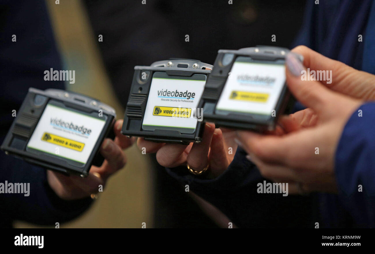 Members of ScotRail staff hold new body-worn CCTV cameras at Waverley ...