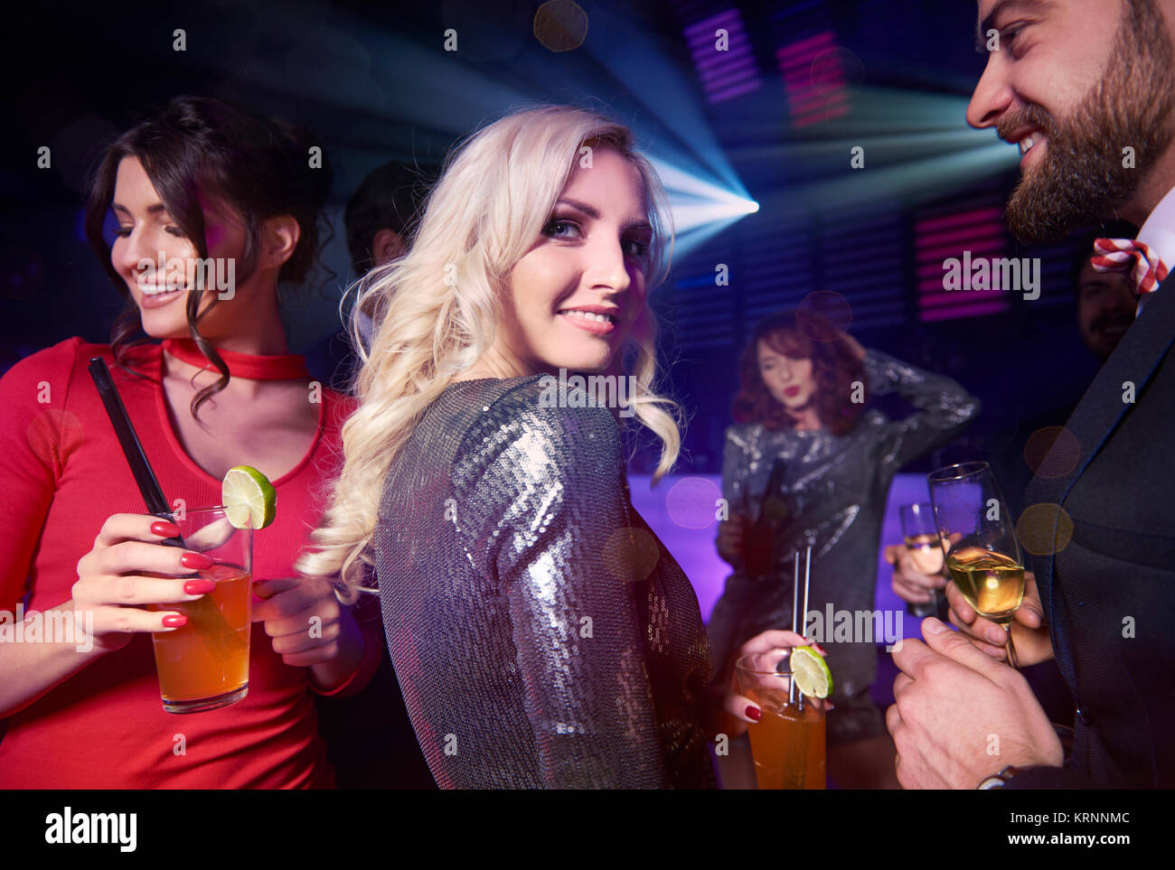 Group of friends with alcohol partying Stock Photo - Alamy