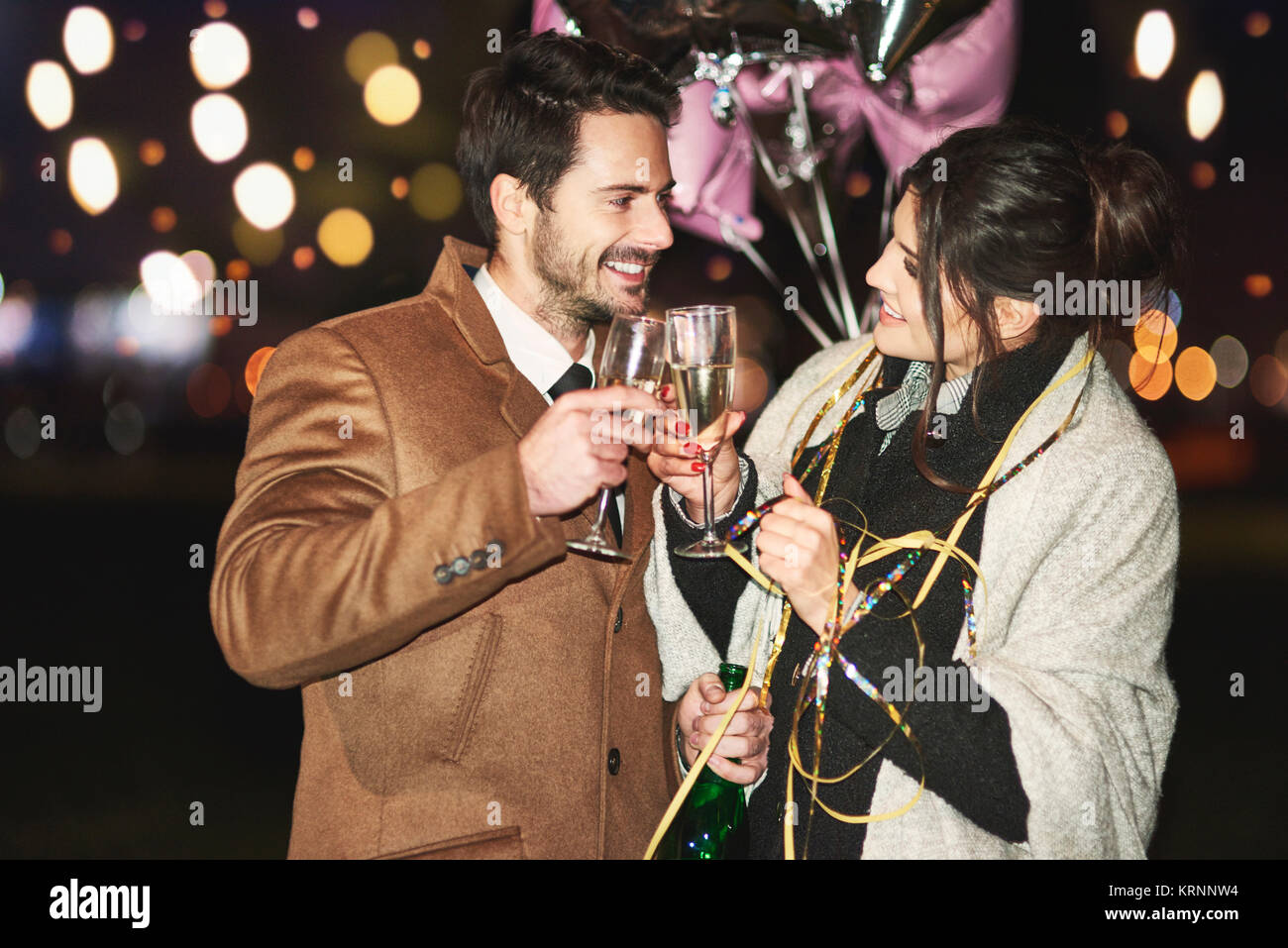 In love couple toasting outdoors Stock Photo - Alamy