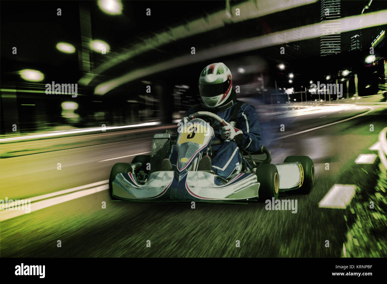 Karting - driver in helmet on kart circuit Stock Photo - Alamy