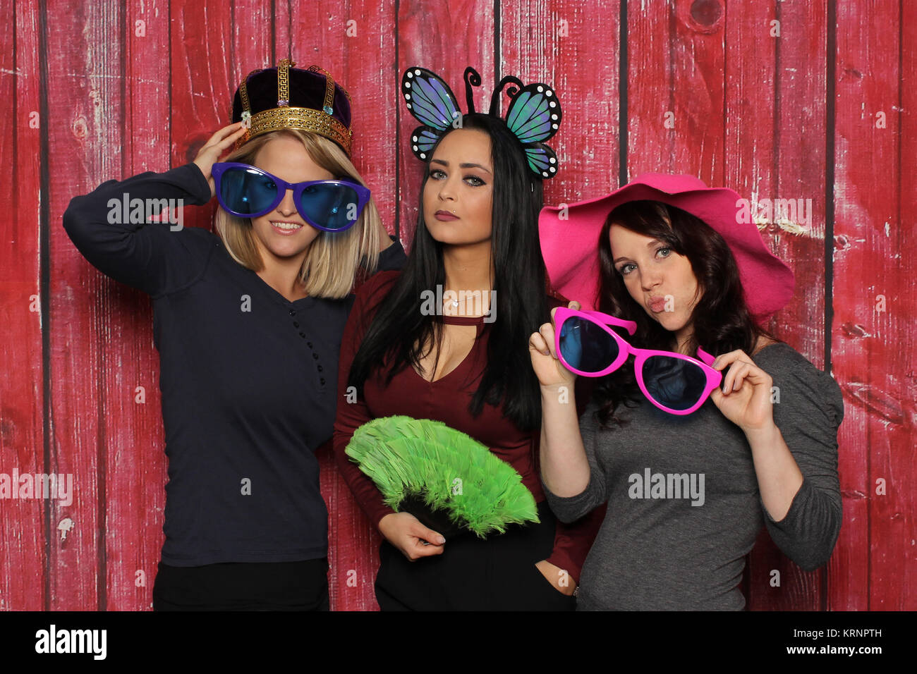 queen and fine ladies in front of a photo box Stock Photo - Alamy
