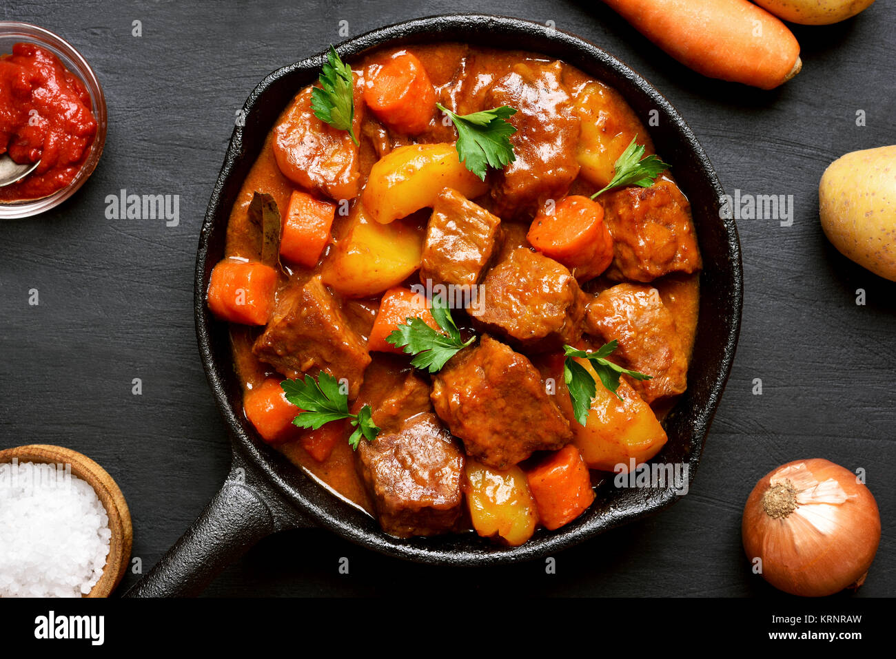 Goulash, beef stew in cast iron pan. Top view, flat lay food Stock ...