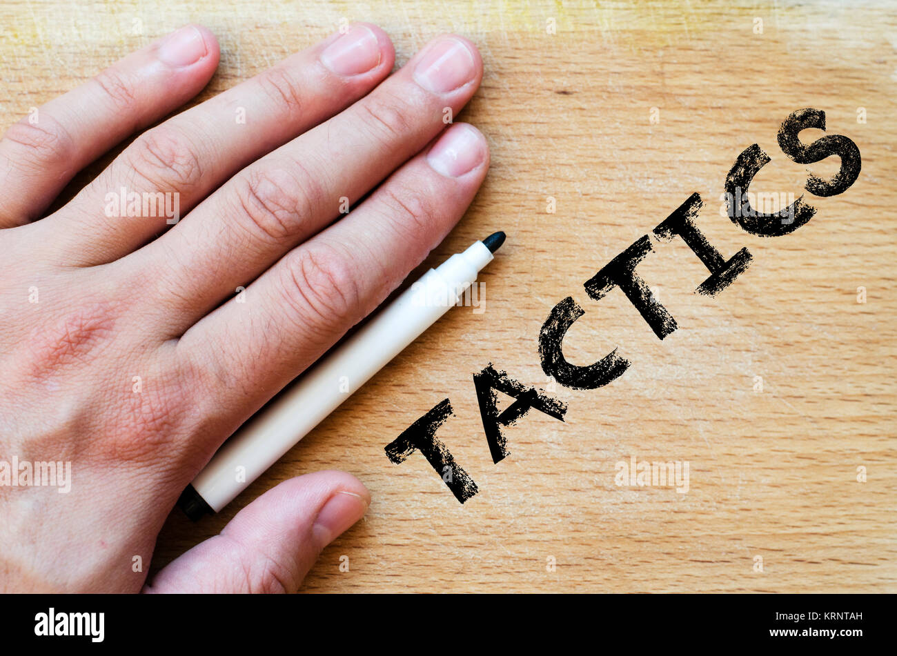 Tactics text concept Stock Photo - Alamy
