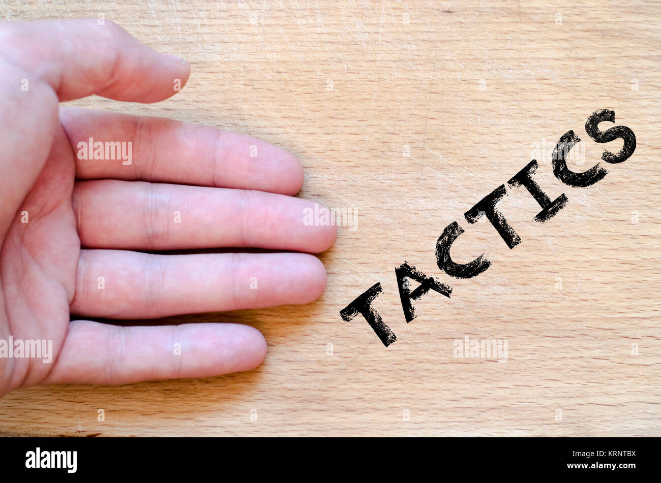 Tactics text concept Stock Photo - Alamy