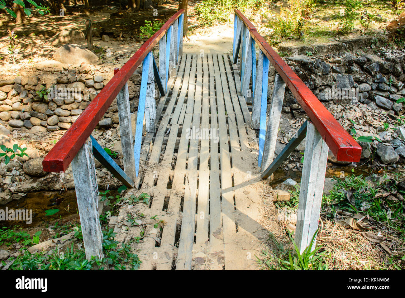 Wooden bridge crossing water hi-res stock photography and images - Alamy