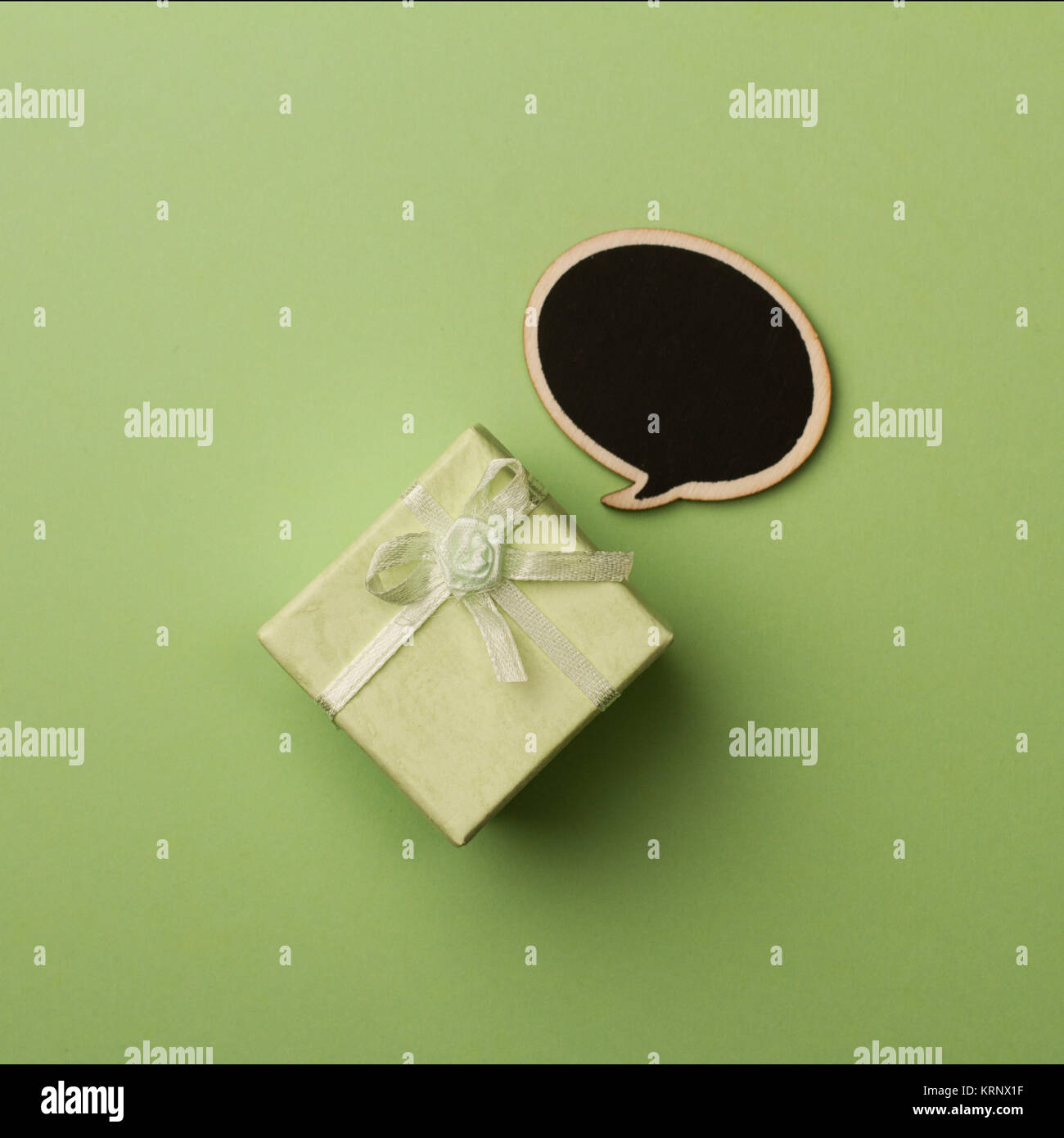 Concept little gift box with wooden speech bubble for messages Stock ...